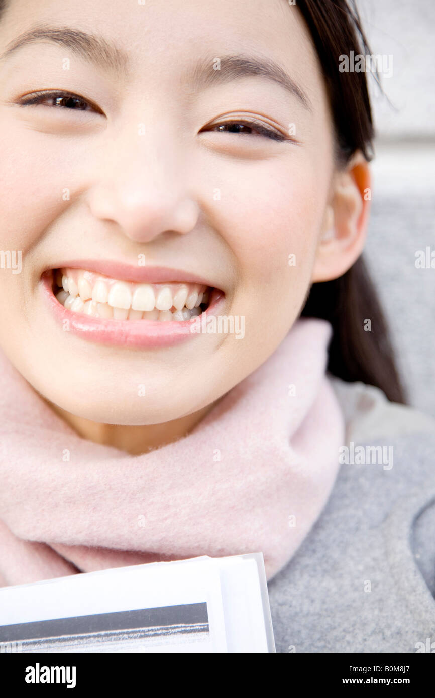 Smiling Japanese woman Stock Photo - Alamy