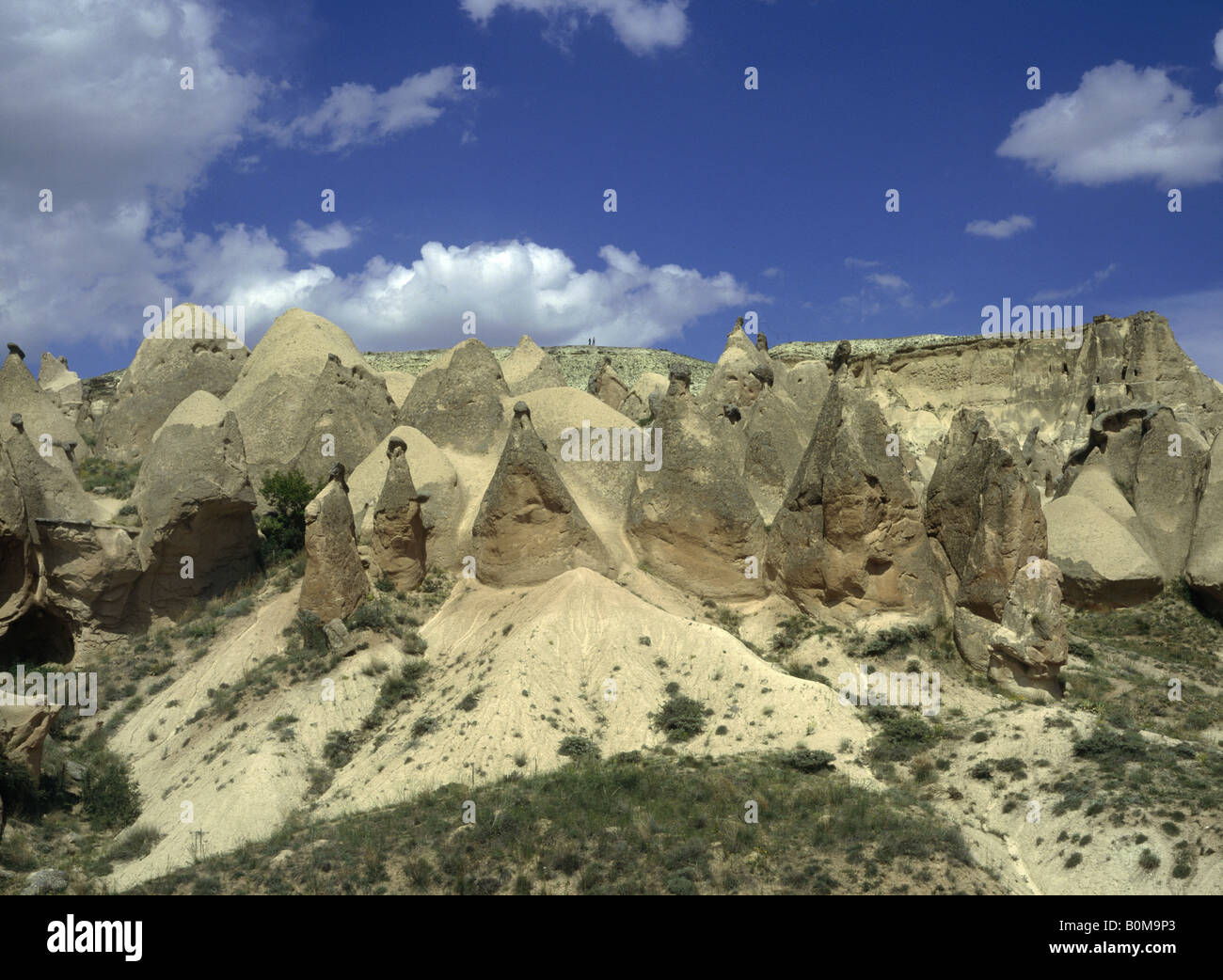 Volcanic tuff landscape. Eroded pillars chimneys rock formations Stock ...