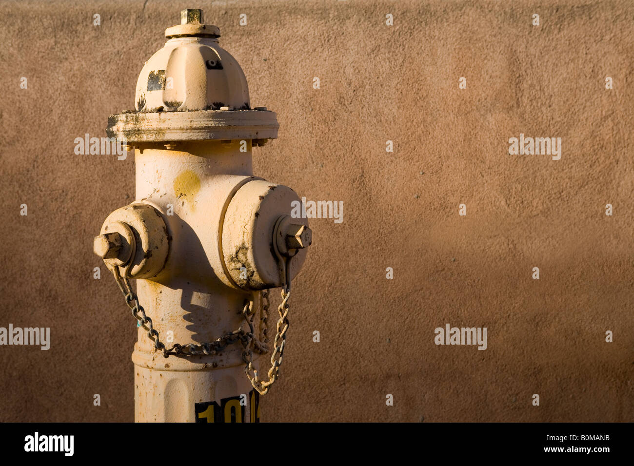 Adobe fire hydrant Stock Photo - Alamy