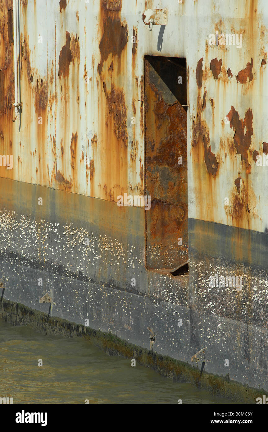 Door in side of rusty ship's hull Stock Photo - Alamy