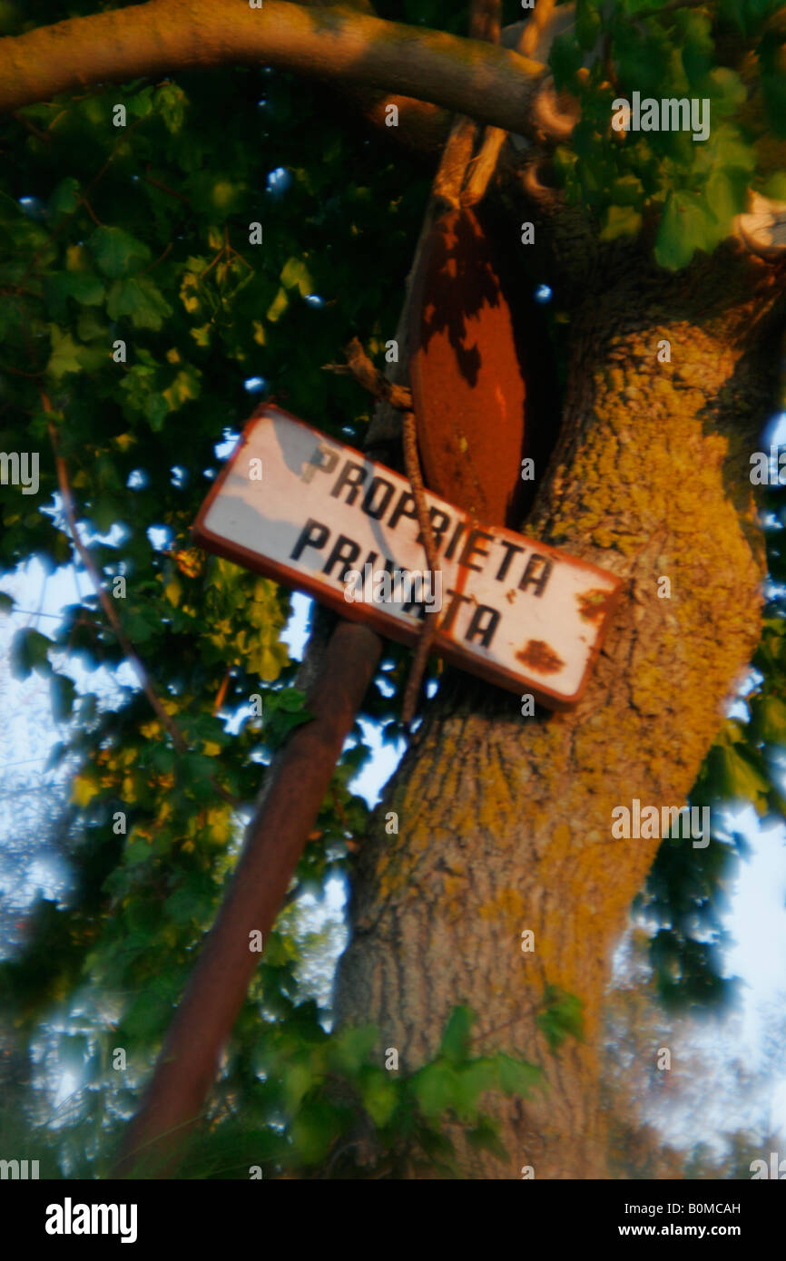 Private property sign by tree Stock Photo - Alamy