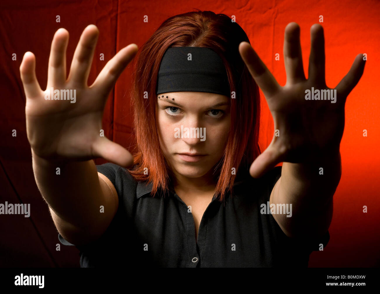 Teenager drawing a square with her hands Stock Photo - Alamy