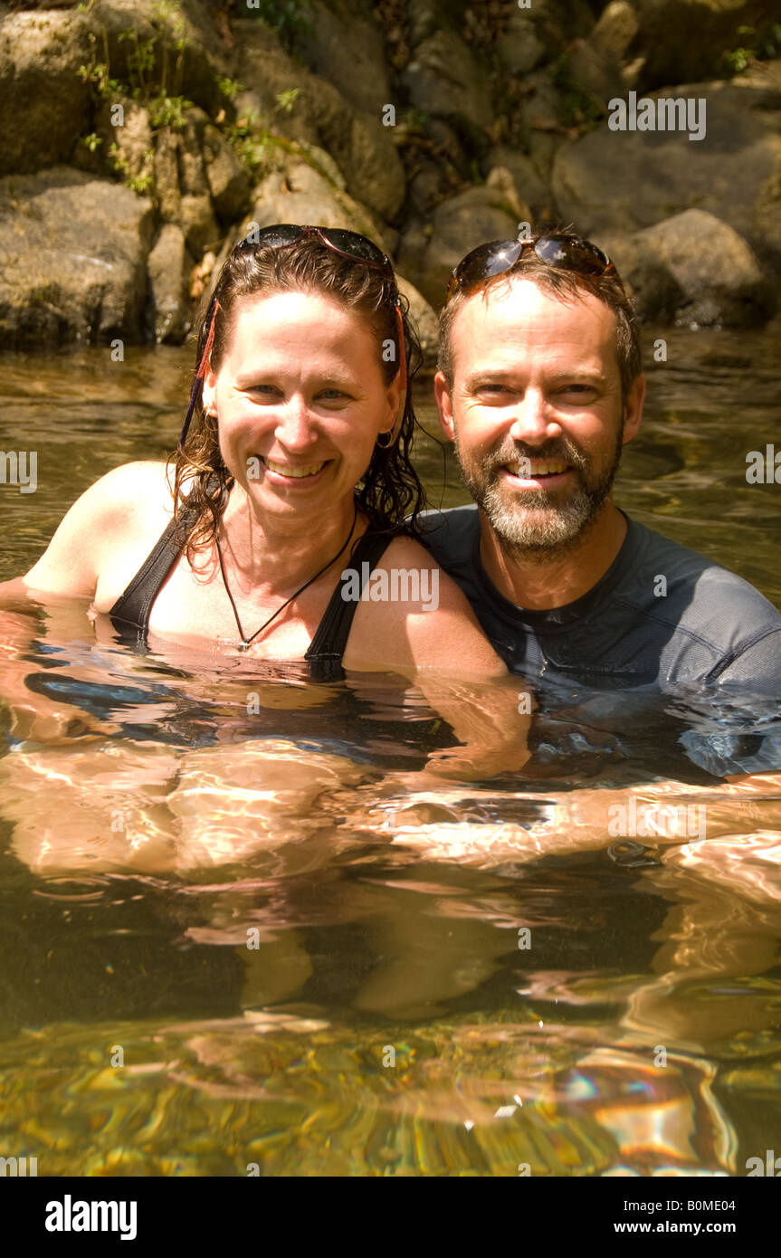 COSTA RICA Happy Couple enjoying a swim in the river Stock Photo - Alamy