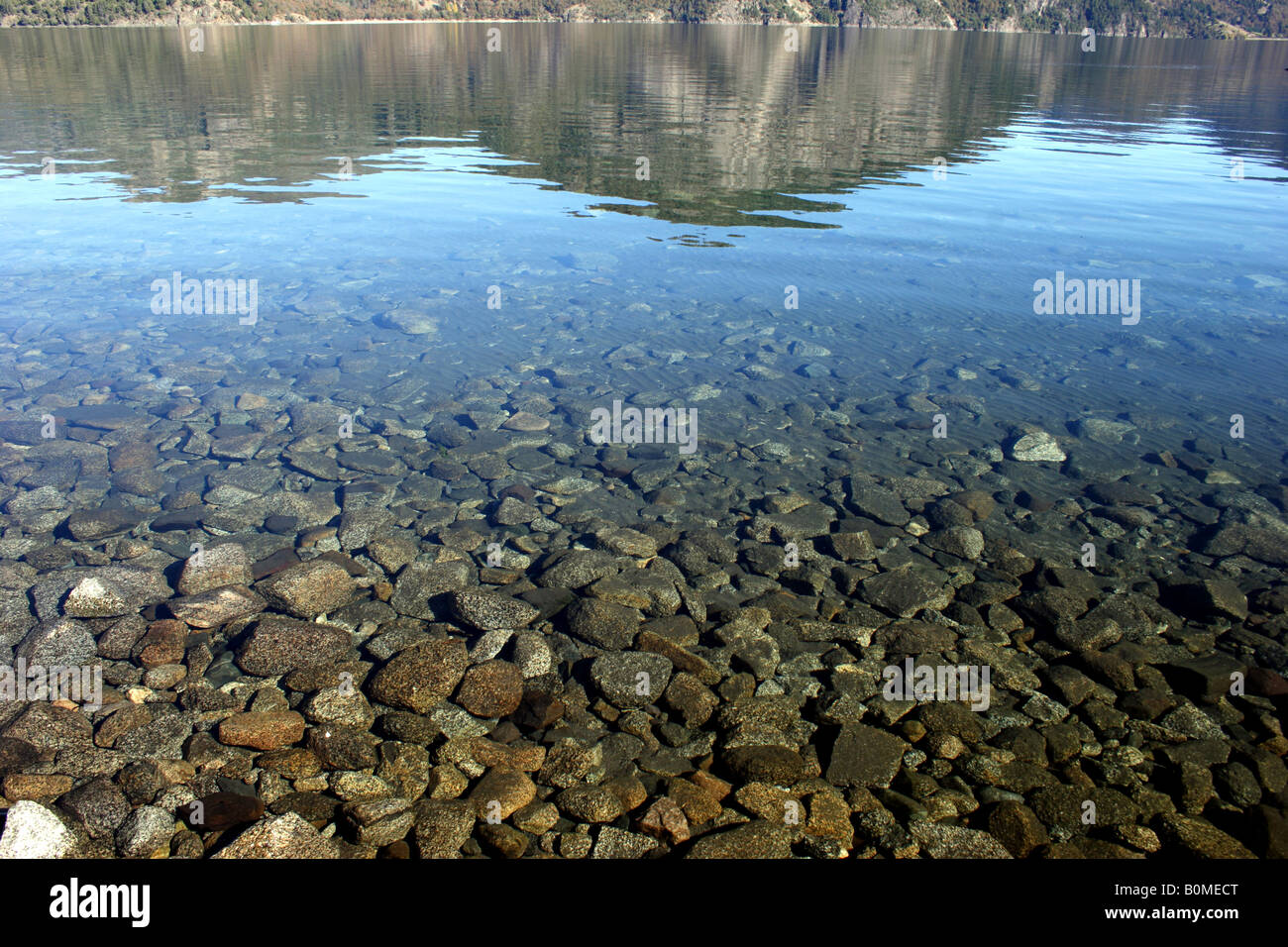 Shallow waters and stones 2 Stock Photo - Alamy