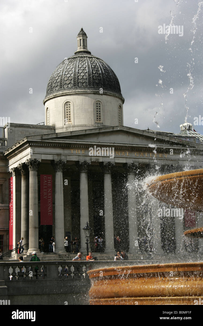 City of London, England. Water fountain in Trafalgar Square with the ...