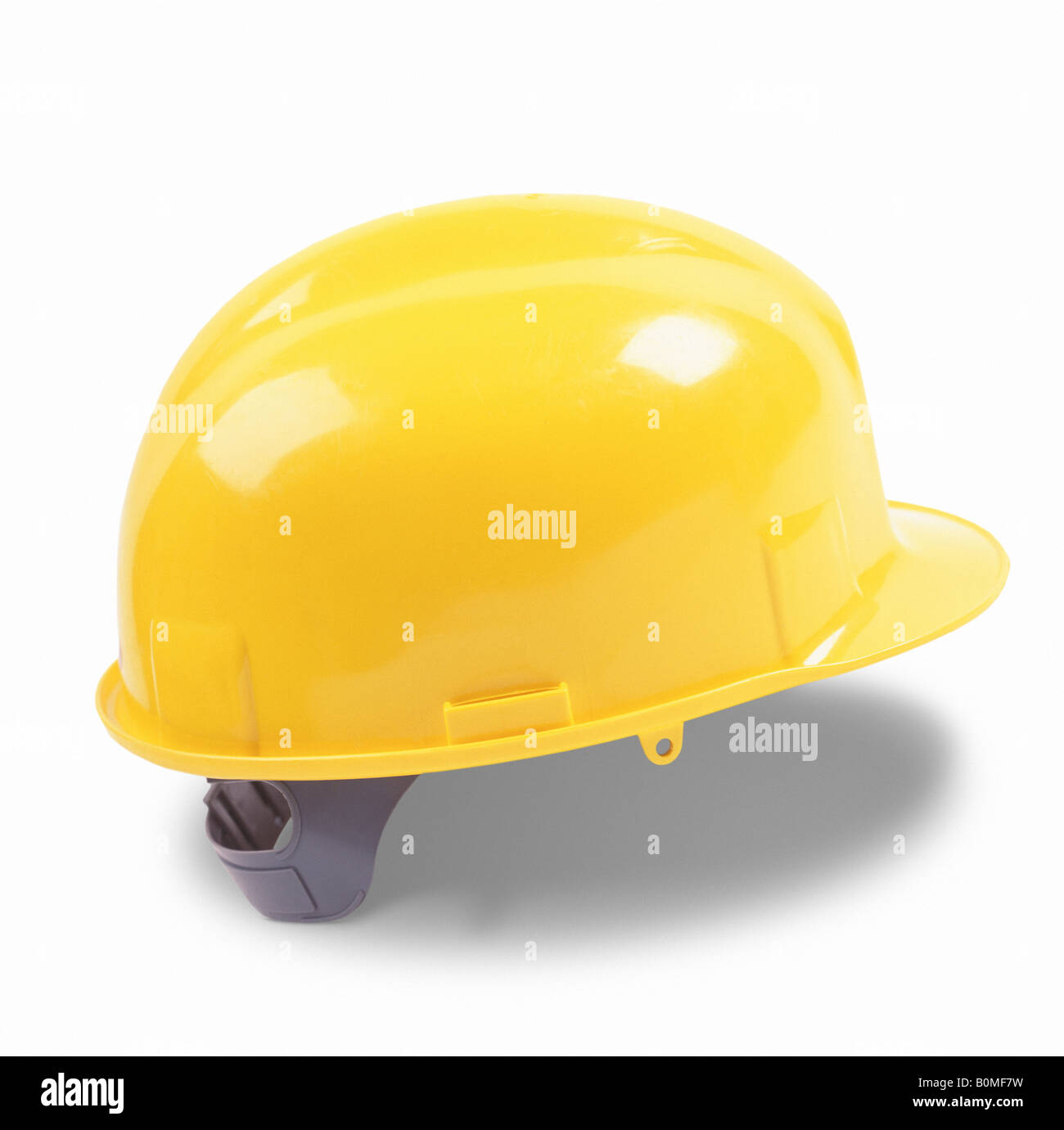 builders plastic yellow hard hat Stock Photo - Alamy