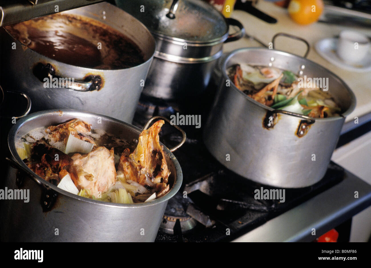 stock pots in a kitchen Stock Photo - Alamy