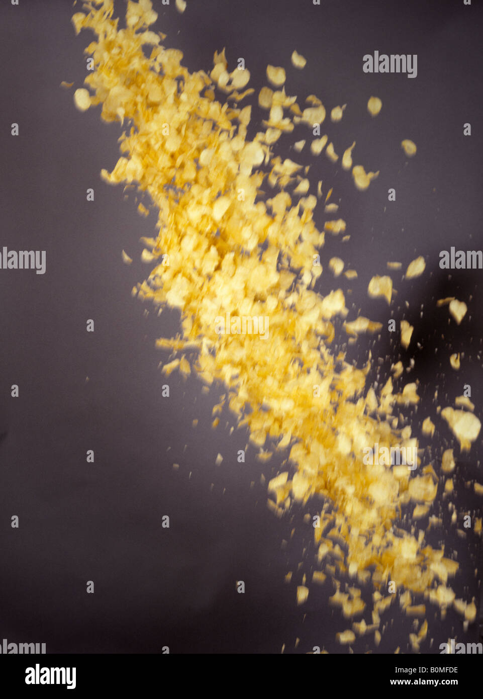 falling potato crisps Stock Photo - Alamy