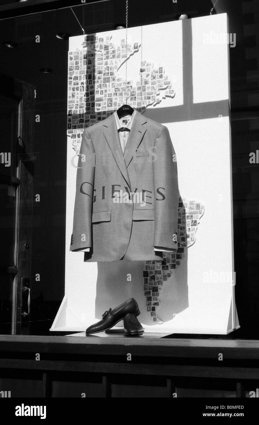 a suit in the window of Gieves and Hawkes in Savile Row London Stock ...