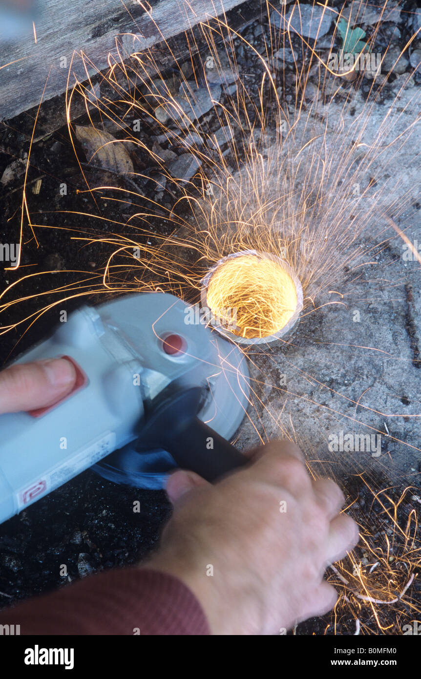 Angle-grinding Metal Pipe & Sparks Stock Photo - Alamy