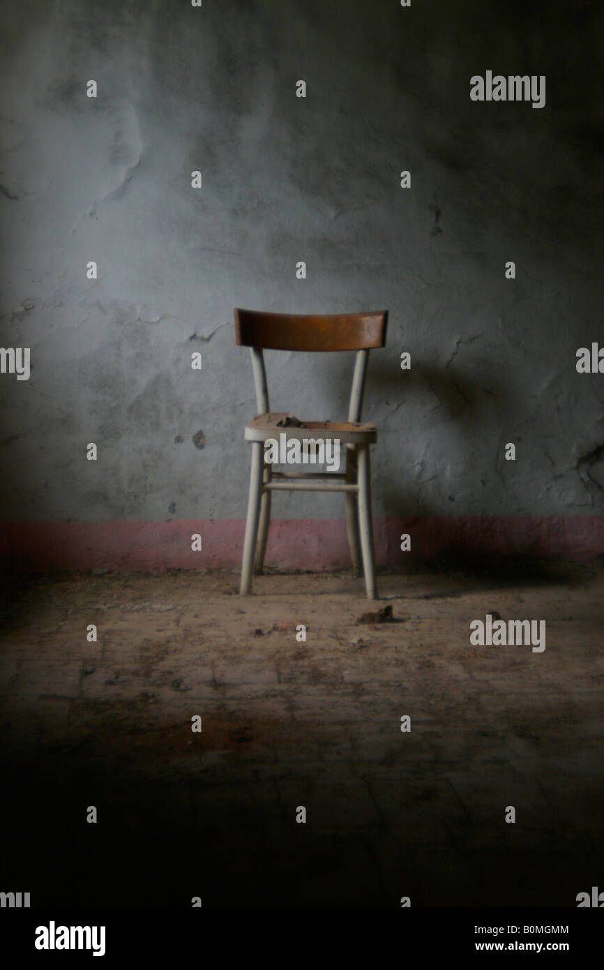 Lone chair in abandoned farmhouse Stock Photo - Alamy
