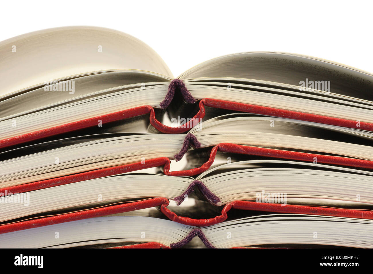 Stack of open books Stock Photo - Alamy