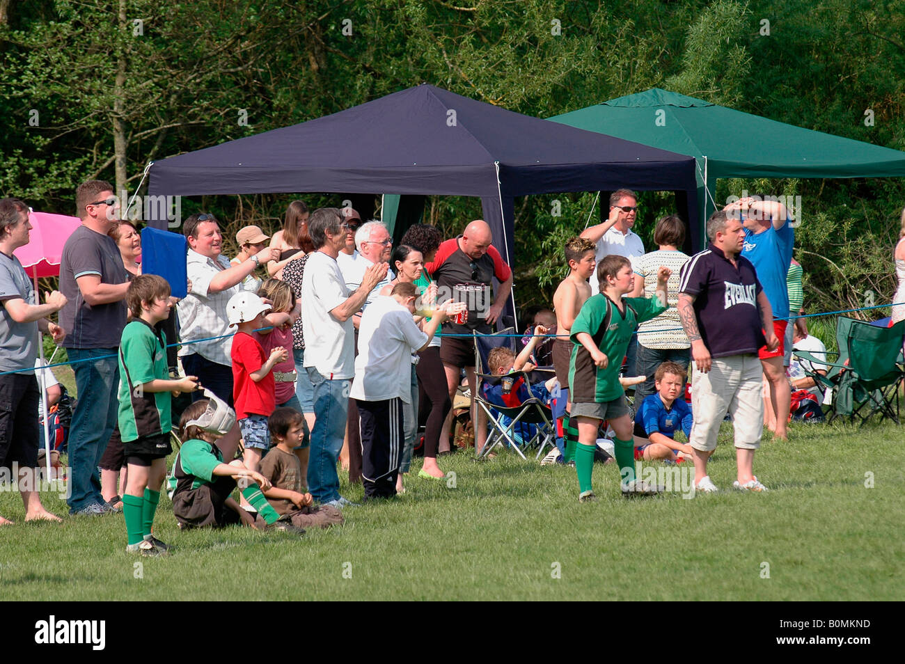 Parents & supporters cheer their team Stock Photo - Alamy