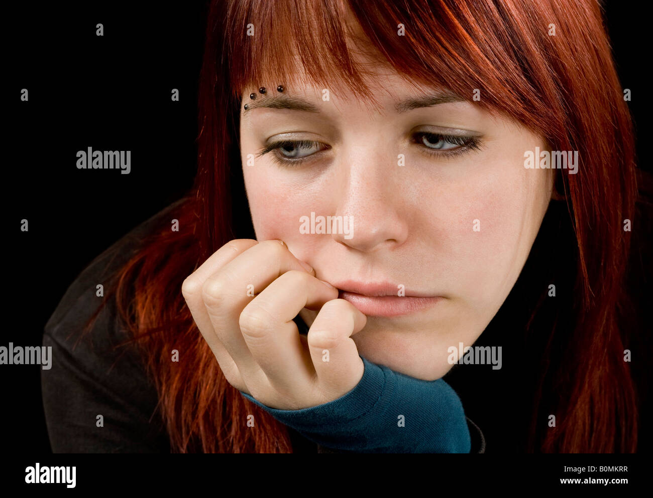 Redhead girl crying and feeling sad and anxious Stock Photo - Alamy