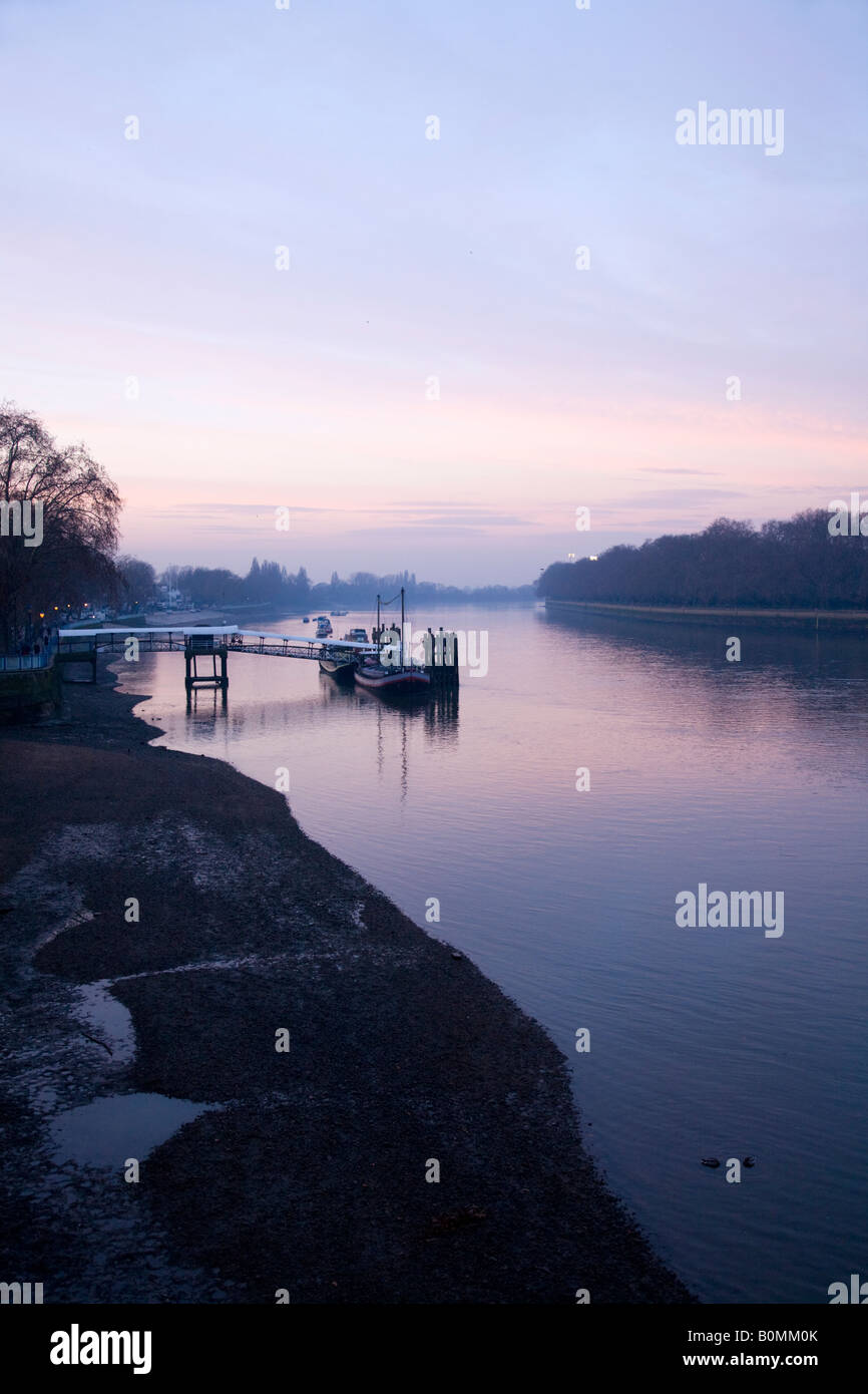 View of the Thames, river bank, and boat jetty, on the Thames at Putney ...