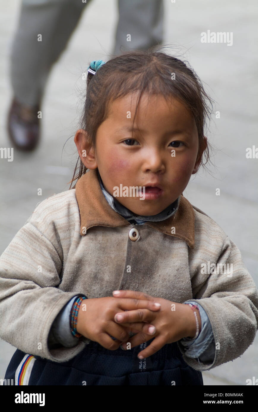 Tibetan child, Barkhor, the traditional Tibetan area of Lhasa, Tibet ...