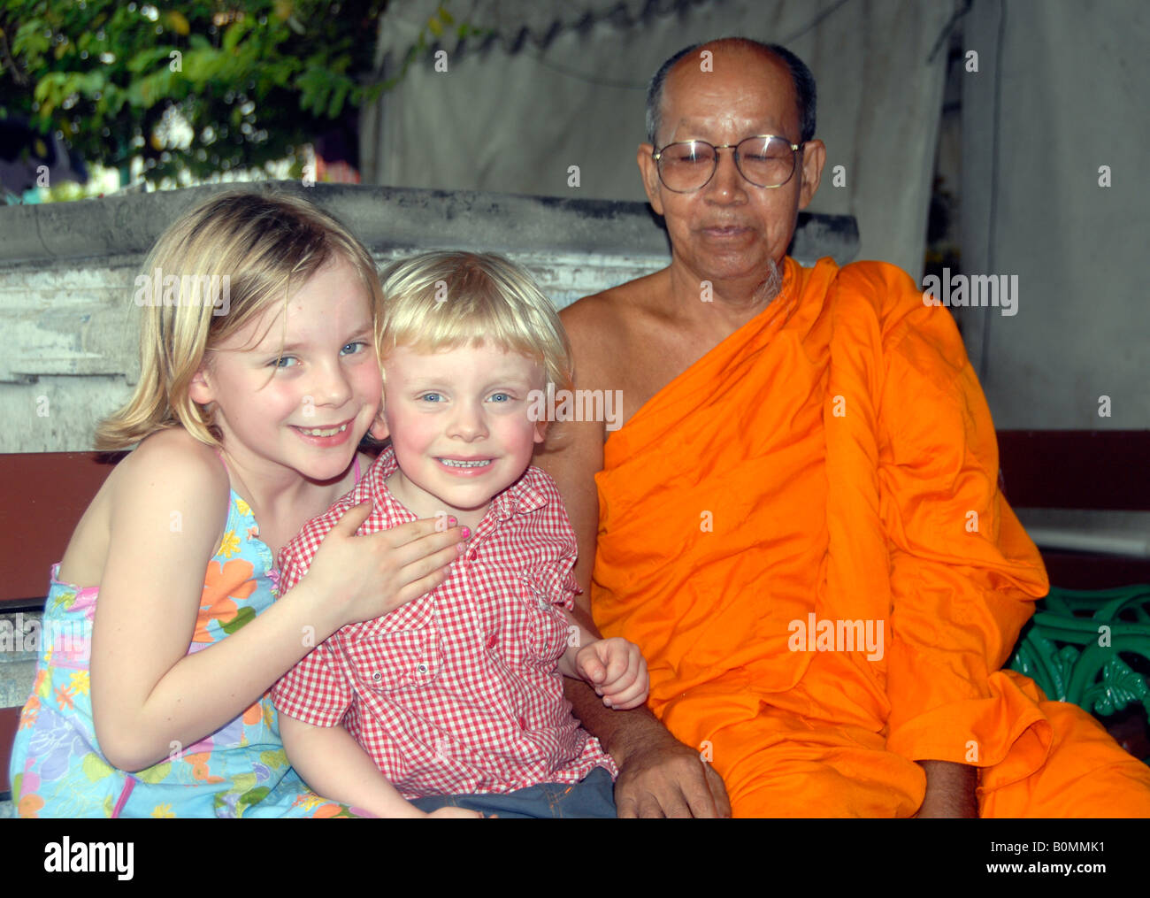 Lucy and Wilf with monk, Wat Arun, Bangkok, Thailand Stock Photo - Alamy