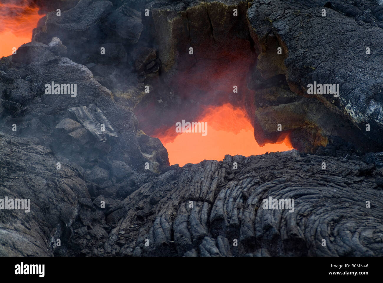 Skylight (hole in cooled lava to show flowing lava beneath), Kilauea ...