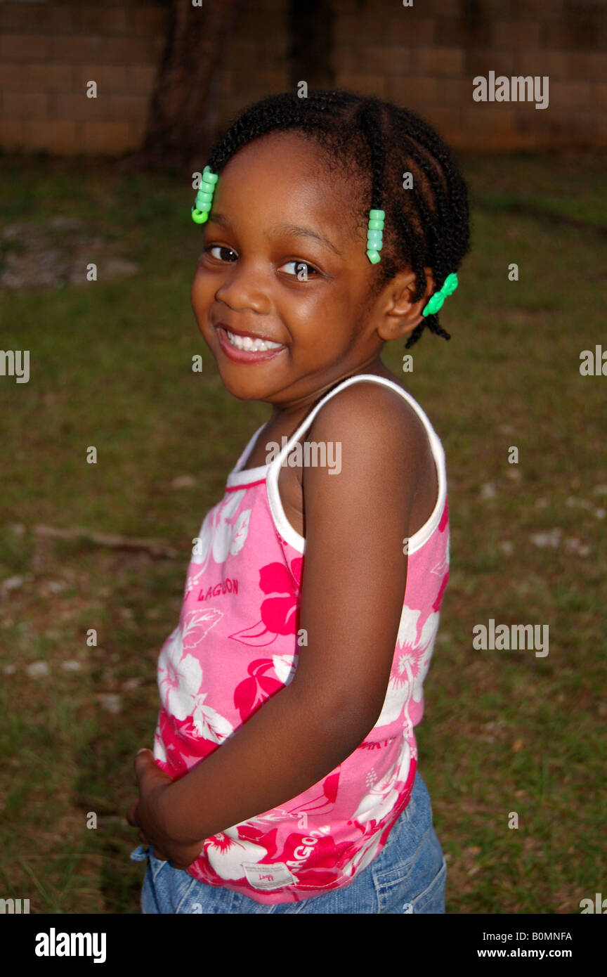 Pretty smiling afro-caribbean girl Stock Photo - Alamy
