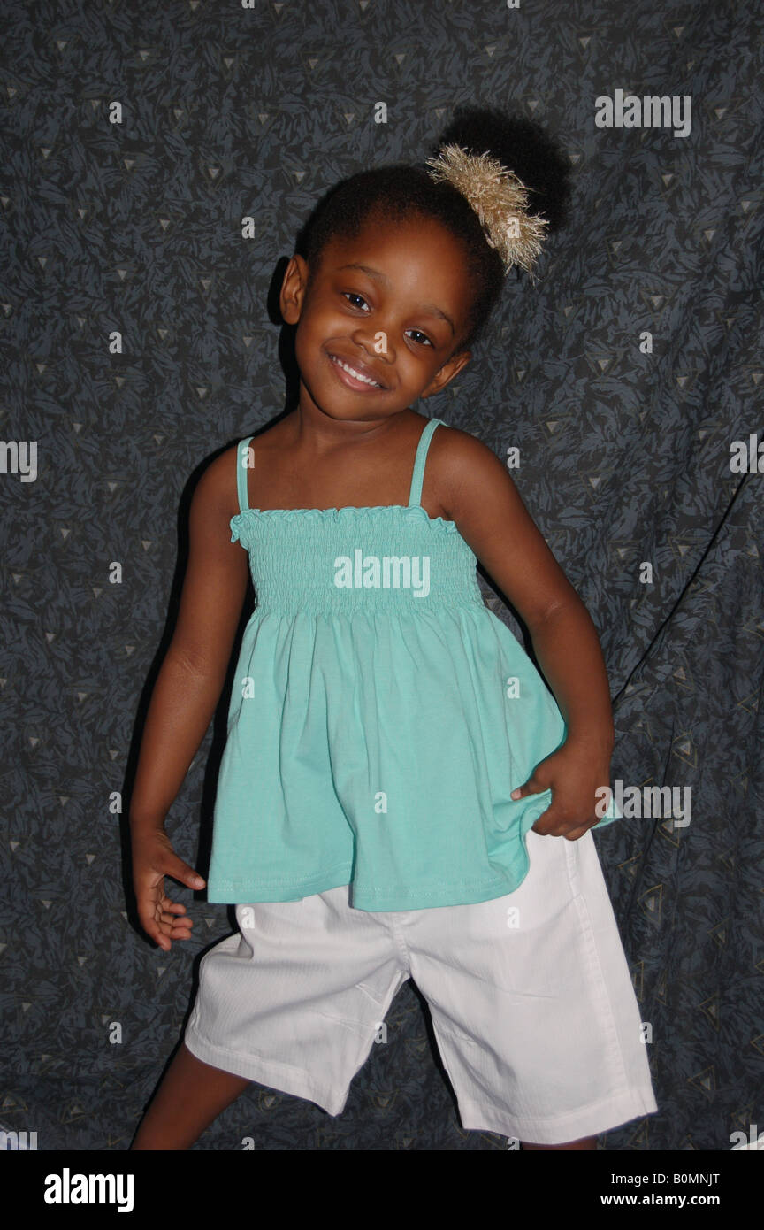 Pretty smiling afro-caribbean girl Stock Photo - Alamy