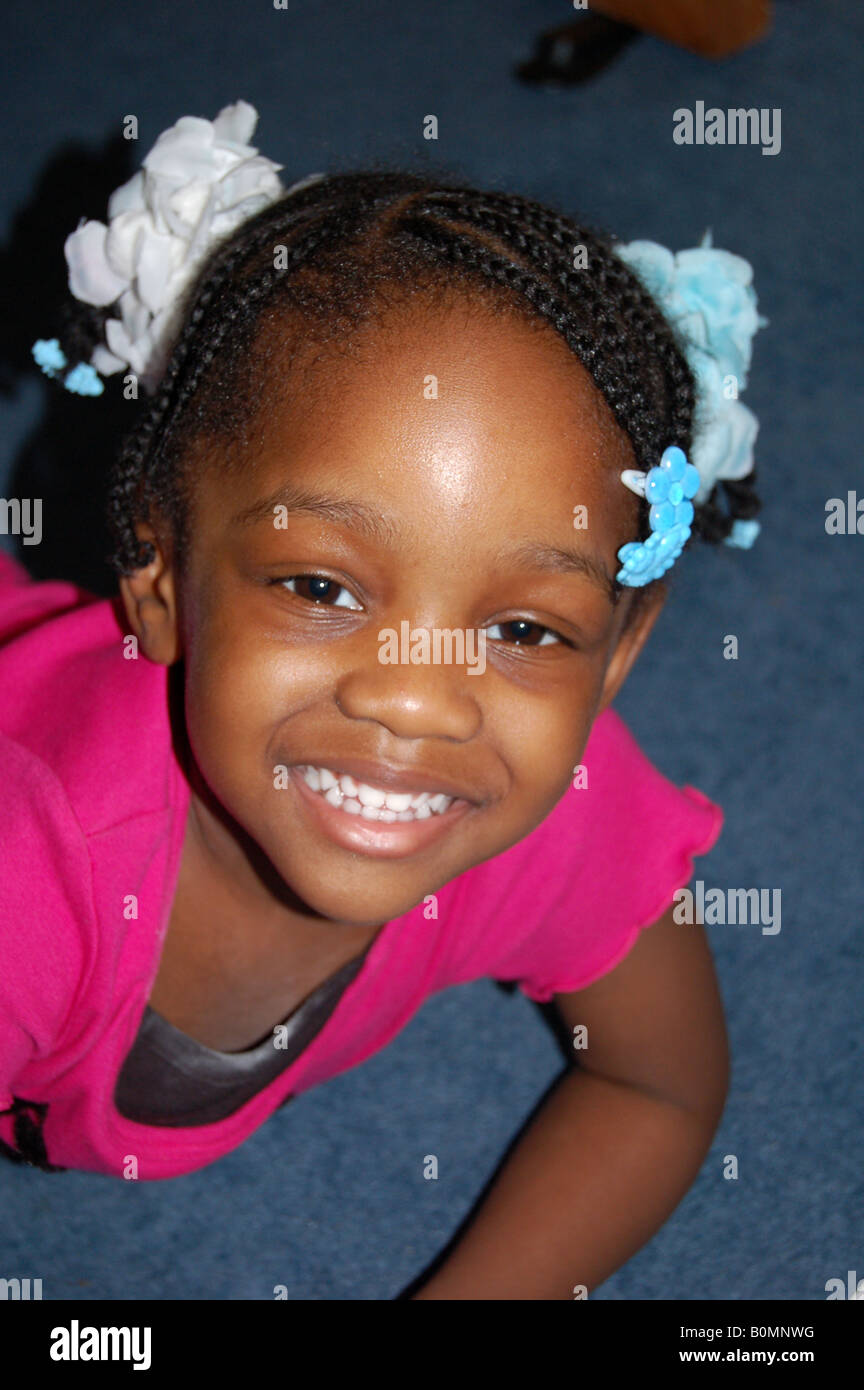 Smiling Afo-caribbean girl Stock Photo - Alamy