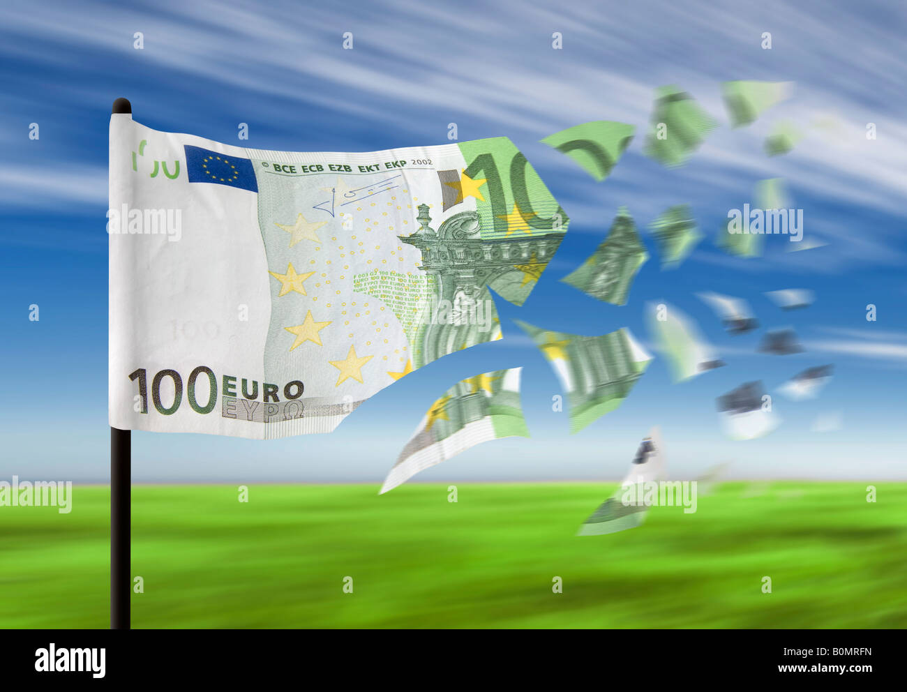 An euro banknote paper money falling into pieces in the wind Stock ...