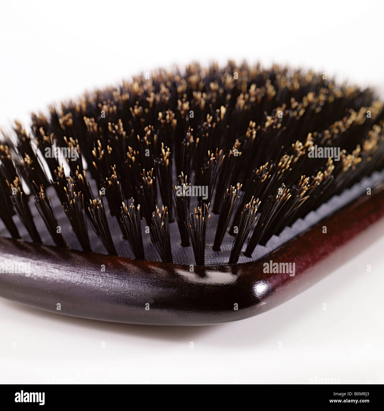 Brown Square hairbrush close up Stock Photo - Alamy