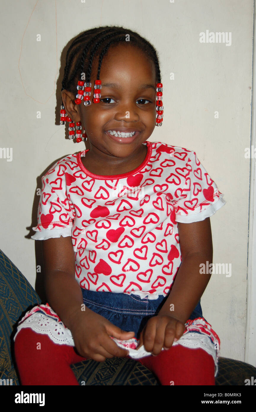 Smiling Afo-caribbean girl Stock Photo - Alamy