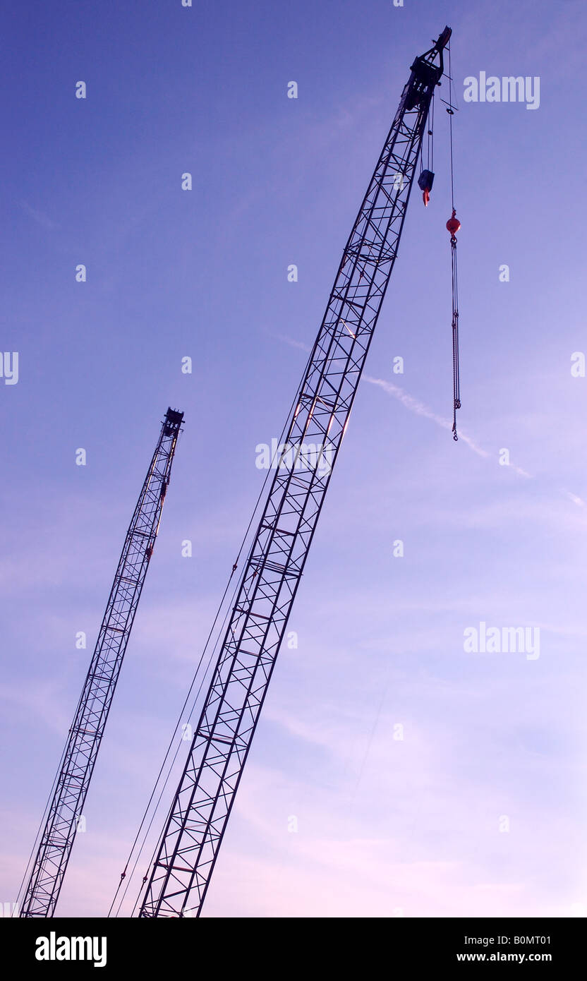 Crane Booms at Dawn Stock Photo - Alamy