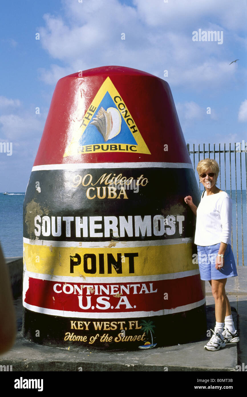 Woman southernmost point key west hi-res stock photography and images ...