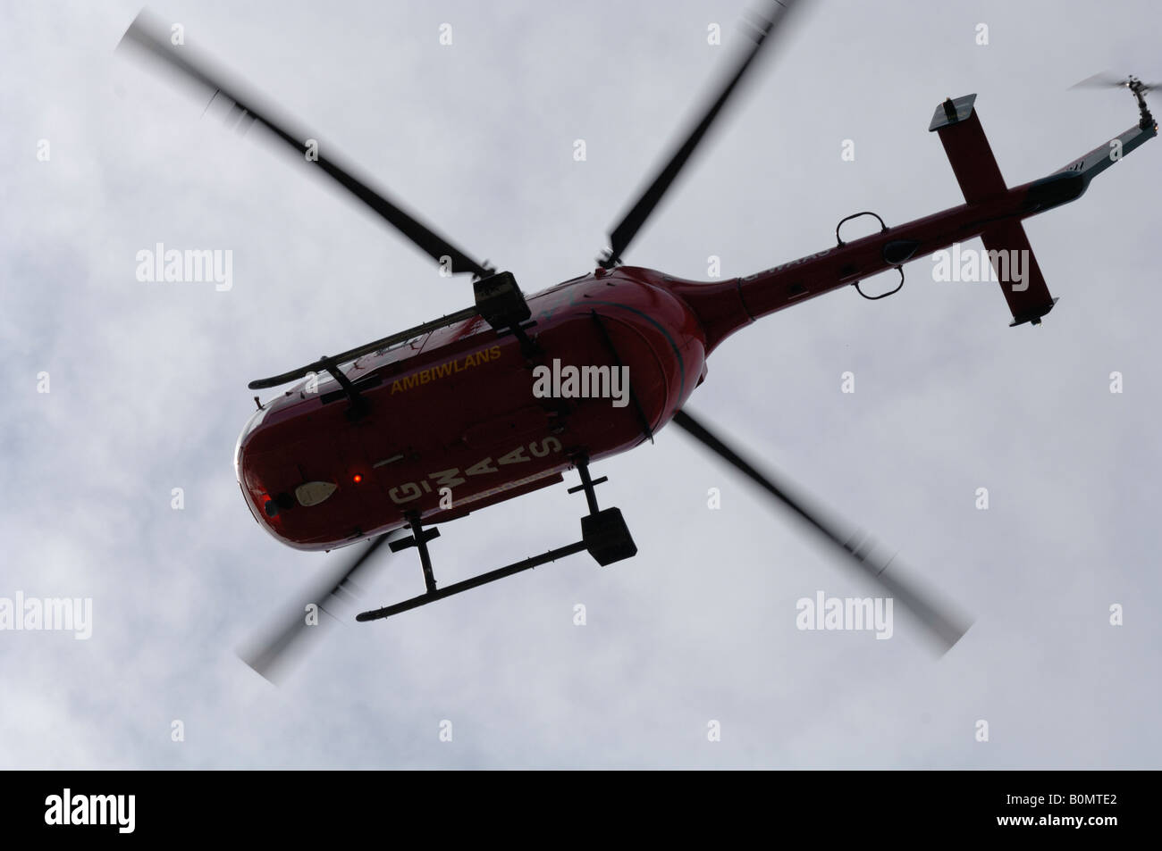 Wales Air Ambulance helicopter in flight after rescuing a casualty at ...