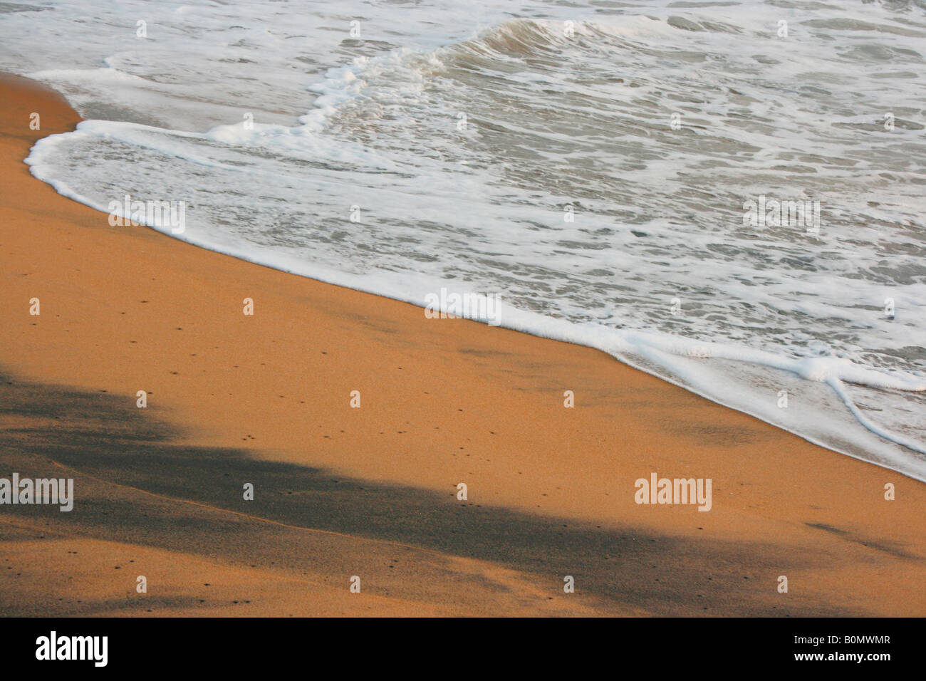Waves on the beach Stock Photo - Alamy