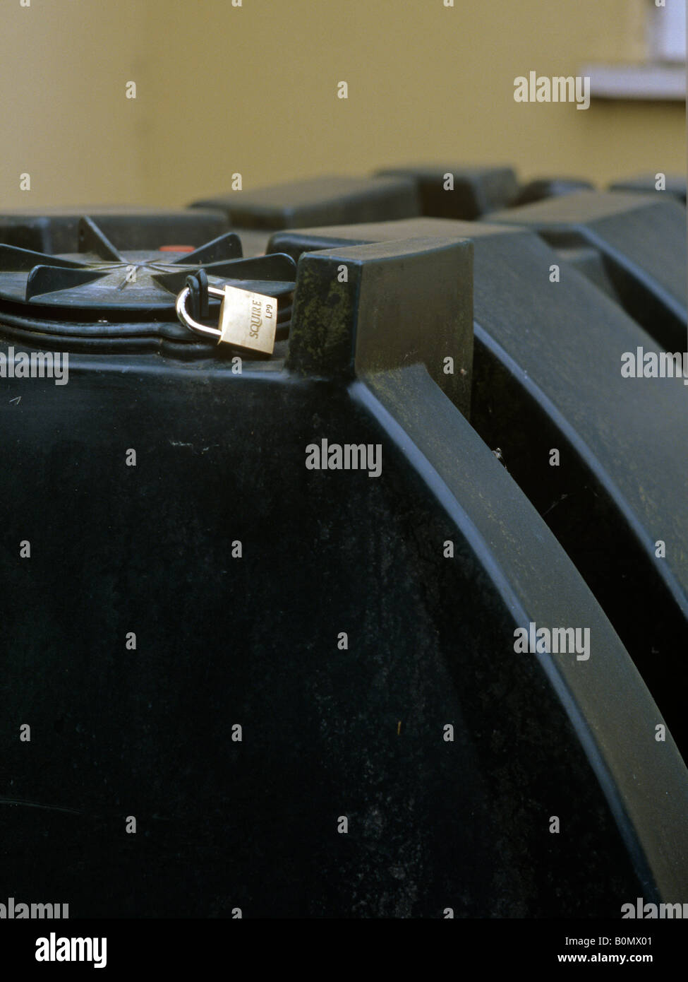 Padlock on domestic heating oil fuel tank Stock Photo - Alamy