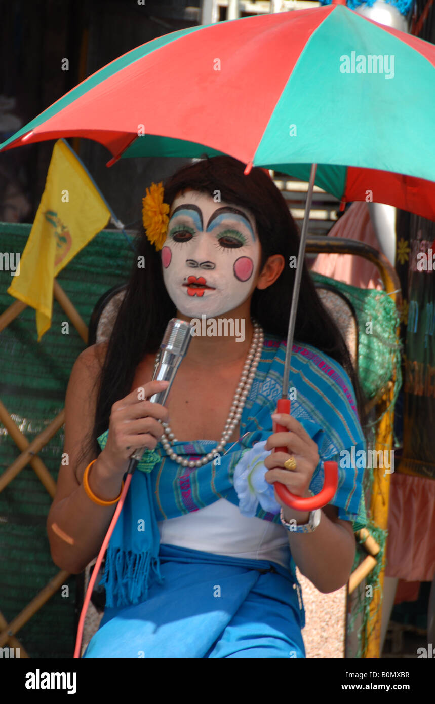 beautiful singer clown at jj market, bangkok, thailand Stock Photo - Alamy