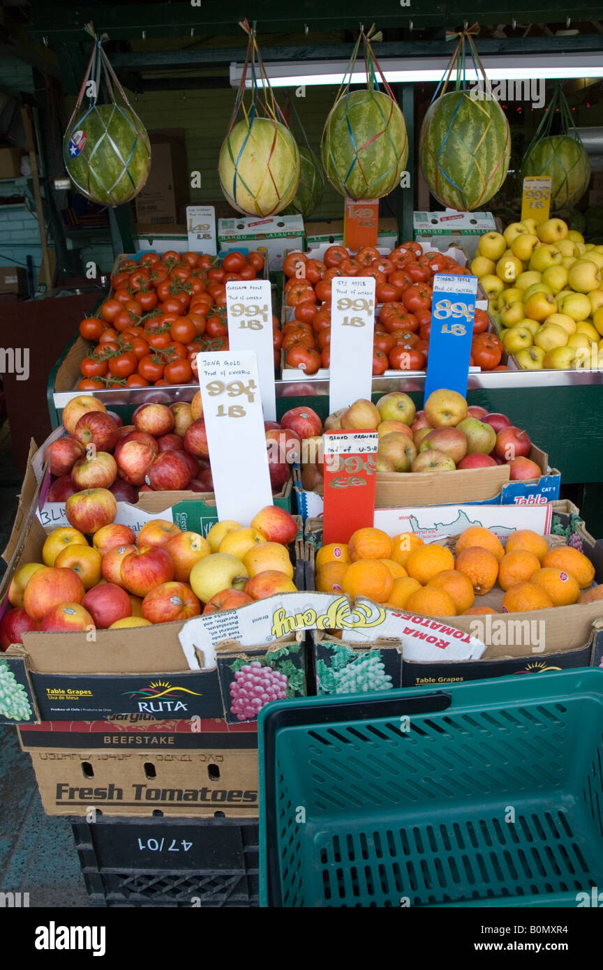 Fruits and vegetables on display outside food store Stock Photo - Alamy