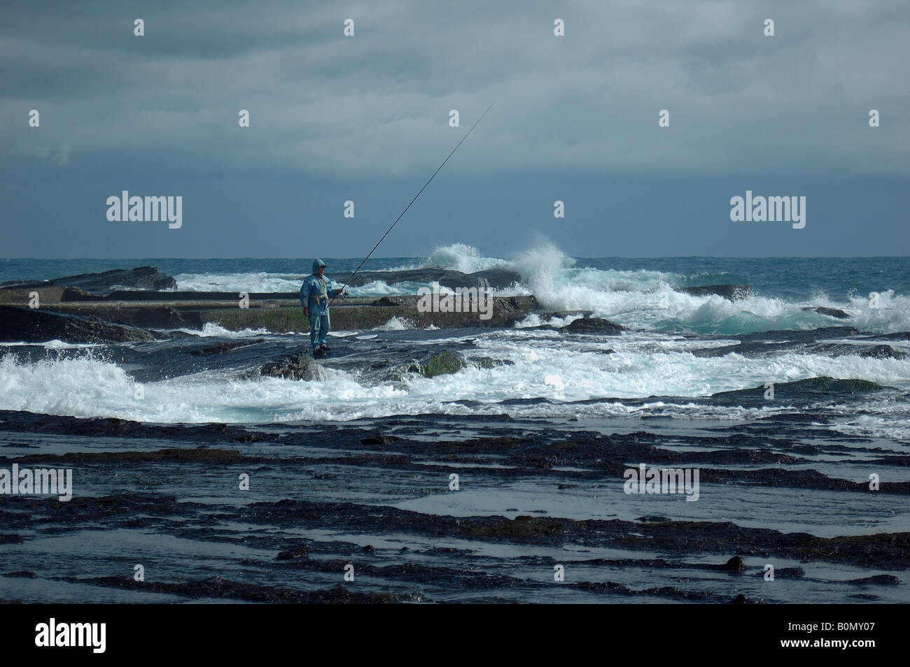 Man Ocean Fishing From Taiwan Shoreline Stock Photo - Alamy