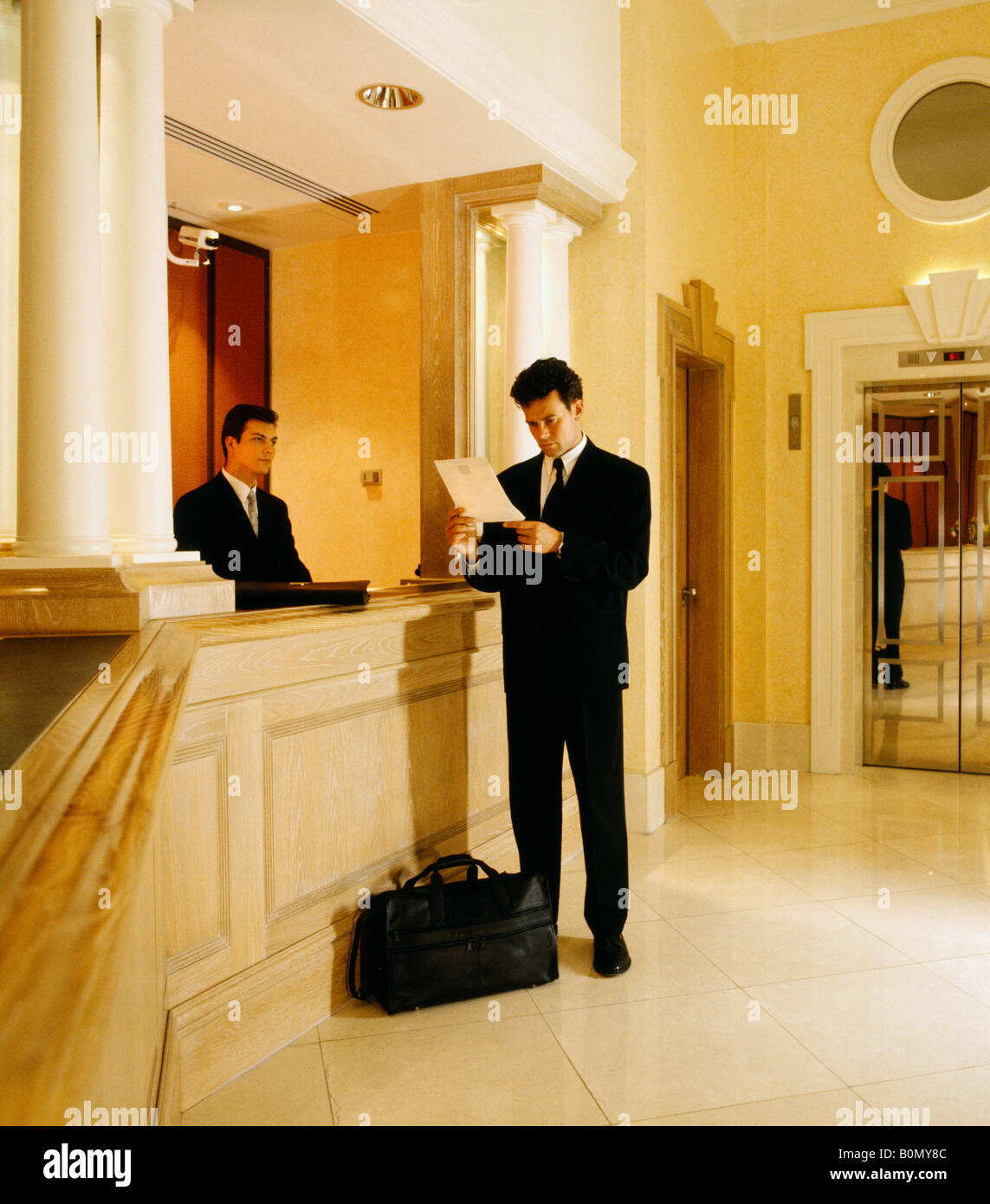 Hotel reception desk night hi-res stock photography and images - Alamy