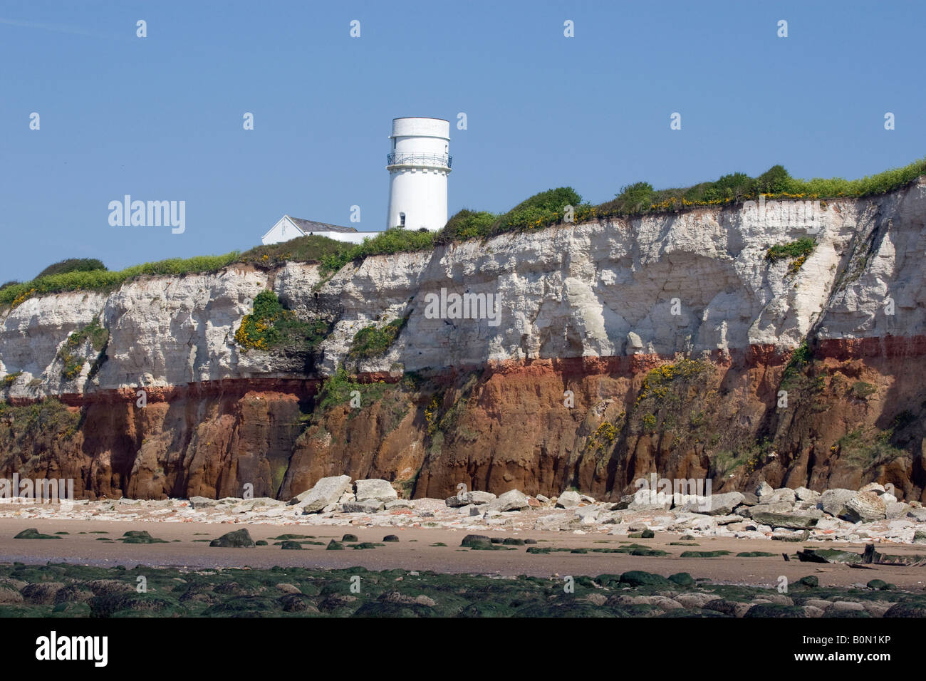 Lighthouse at base of cliff hi-res stock photography and images - Alamy