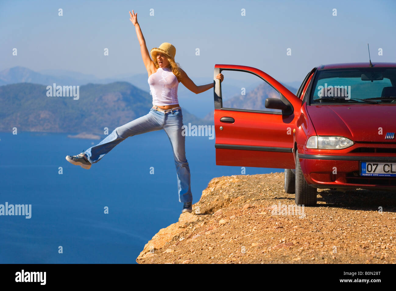Woman car alone happy drive view hi-res stock photography and images ...