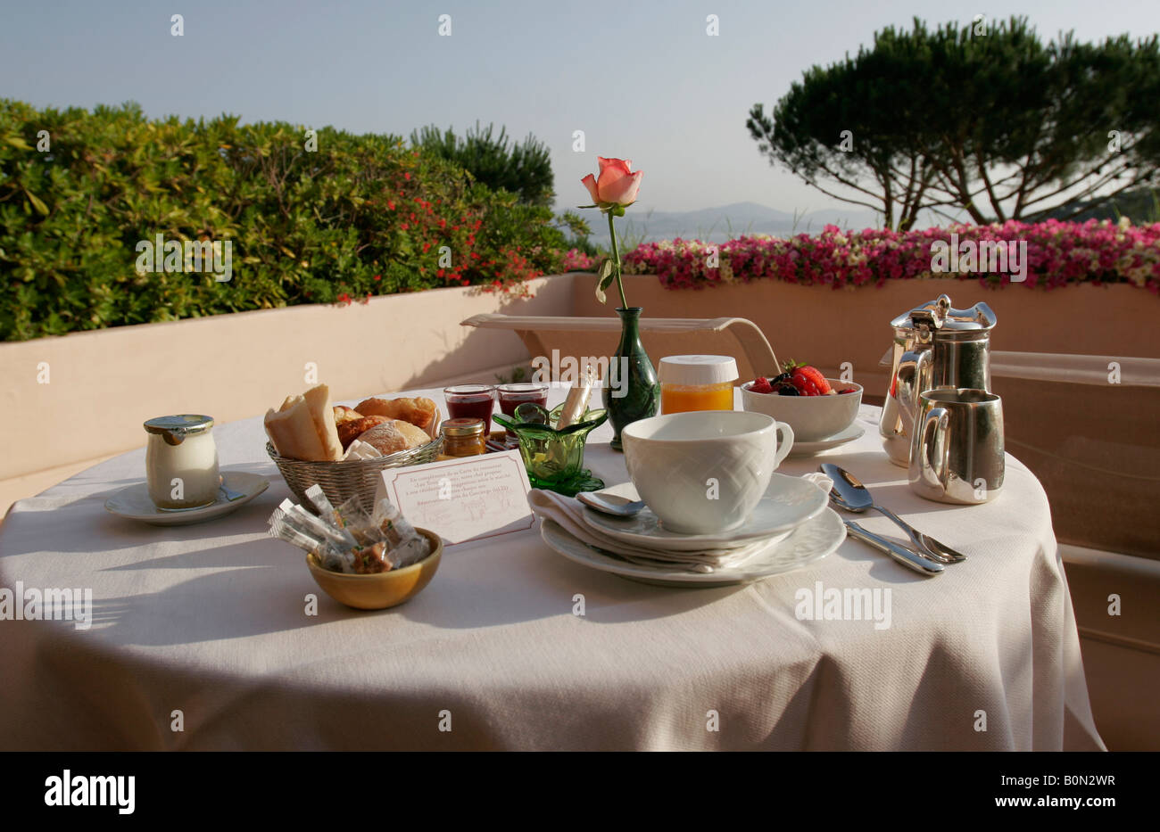 Breakfast setting on a table, France Stock Photo - Alamy