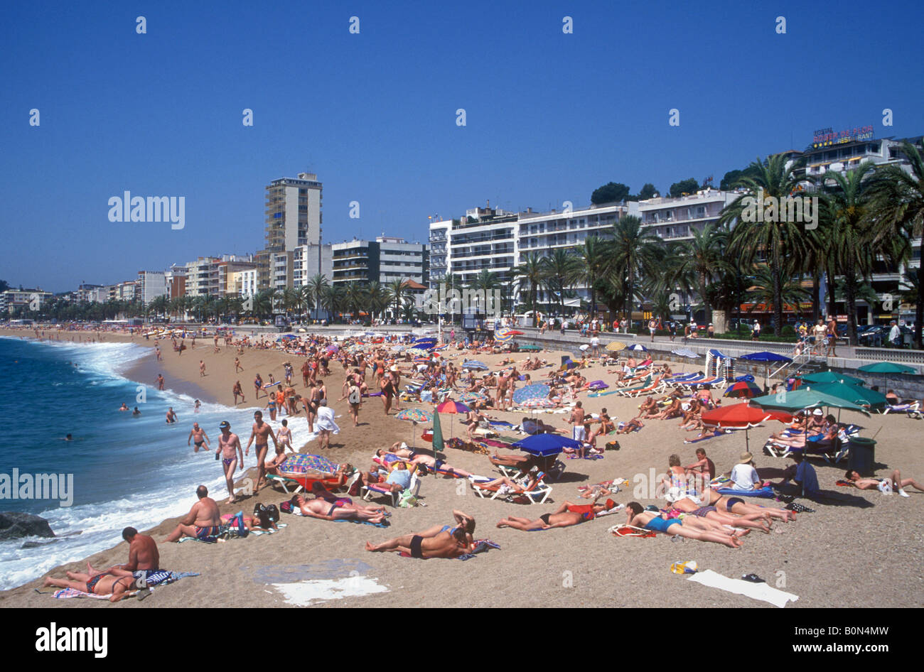 Beach scene at Lloret de Mar Stock Photo - Alamy