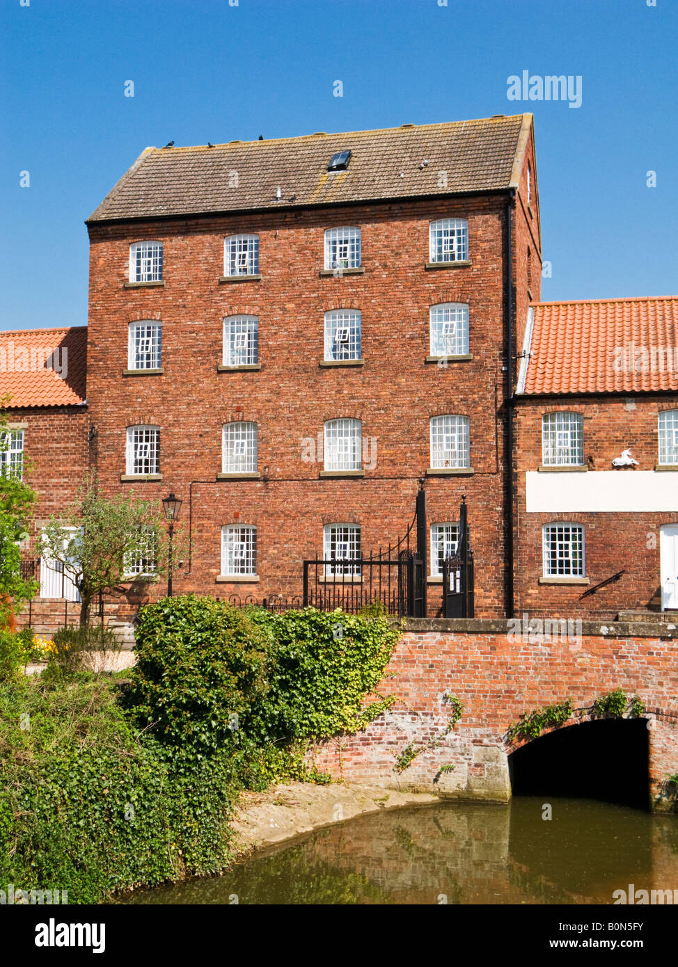 Converted Victorian mill building on the River Rase at Market Rasen in ...