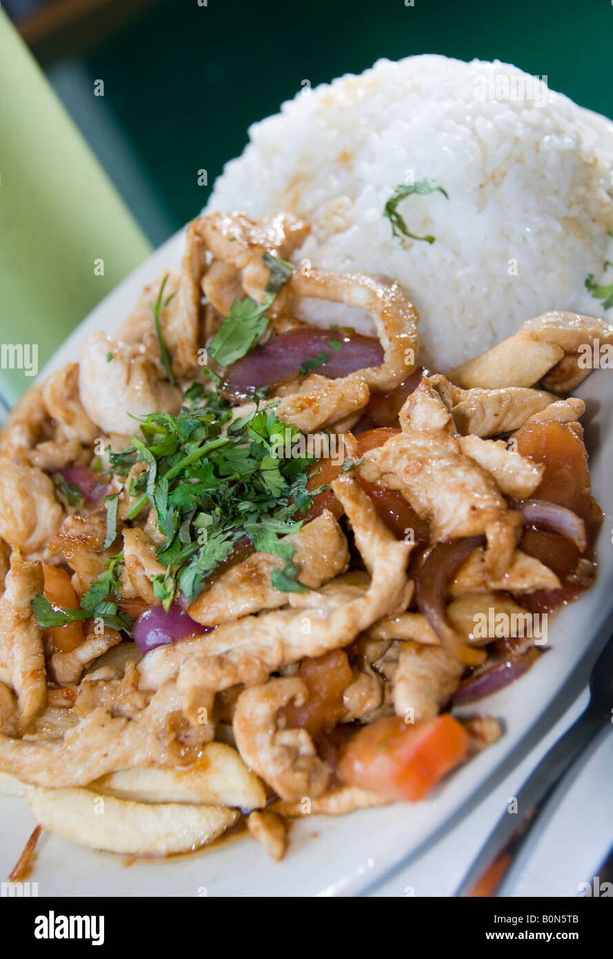 pollo chicken strips saltado authentic peruvian food dish with rice and ...