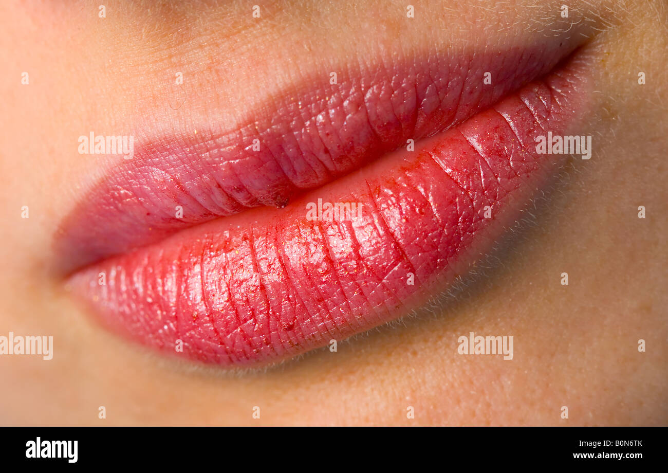the female lips with cosmetics macro shot Stock Photo - Alamy