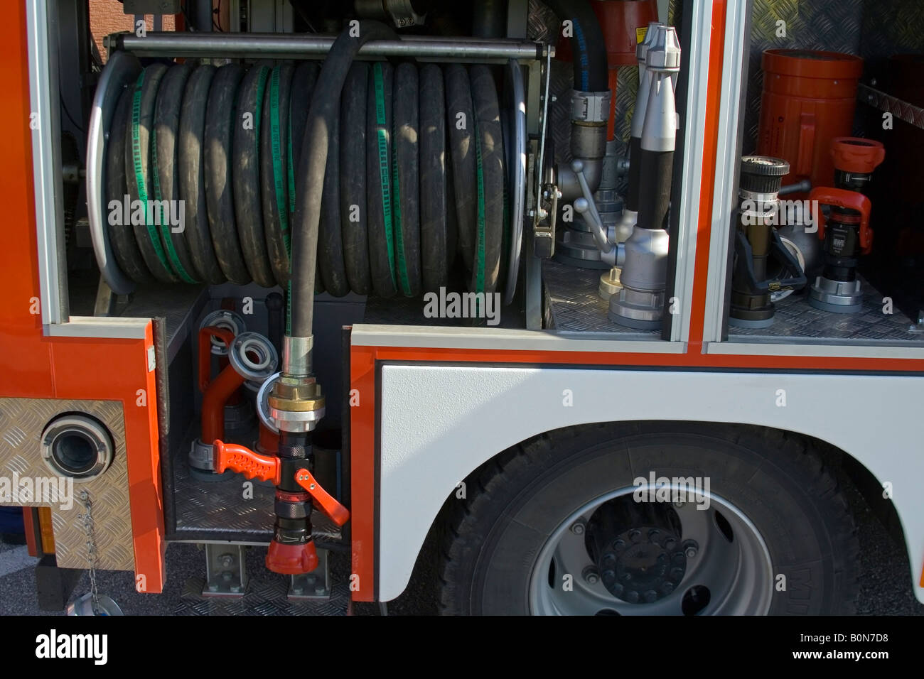 Equipment in the firetruck. Hoses and gages Stock Photo - Alamy