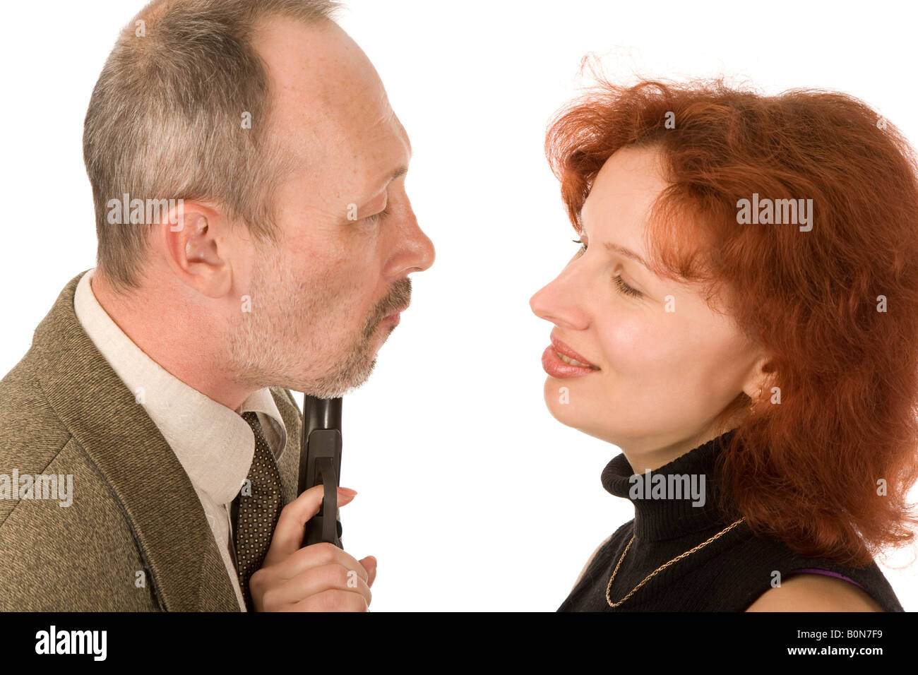 man and woman with gun on white background Stock Photo - Alamy