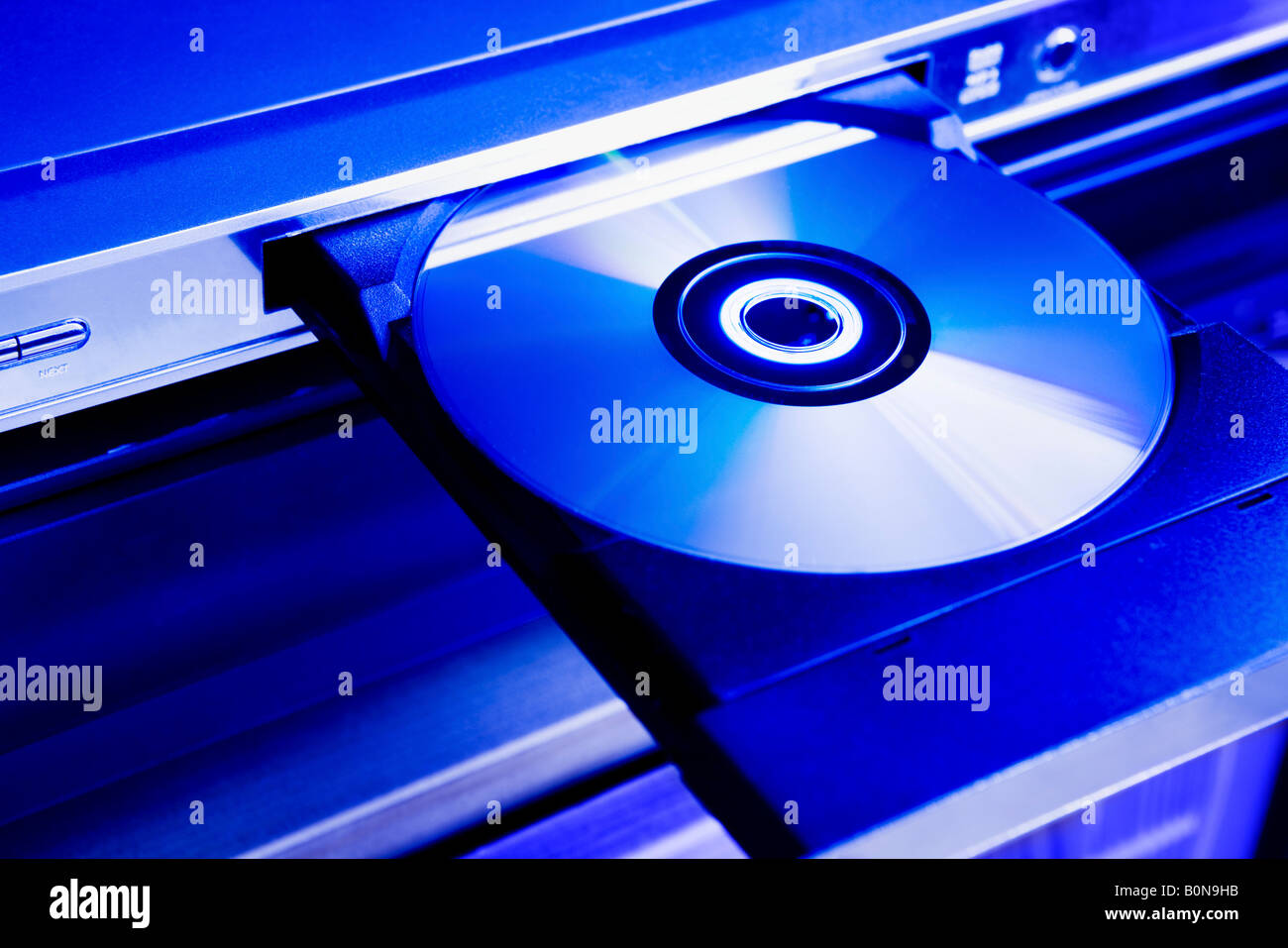 DVD disc on the tray of a dvd player Stock Photo - Alamy