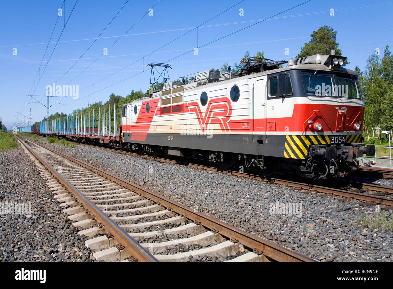 Finnish cargo train locomotive owned by VR and concrete sleepers on ...