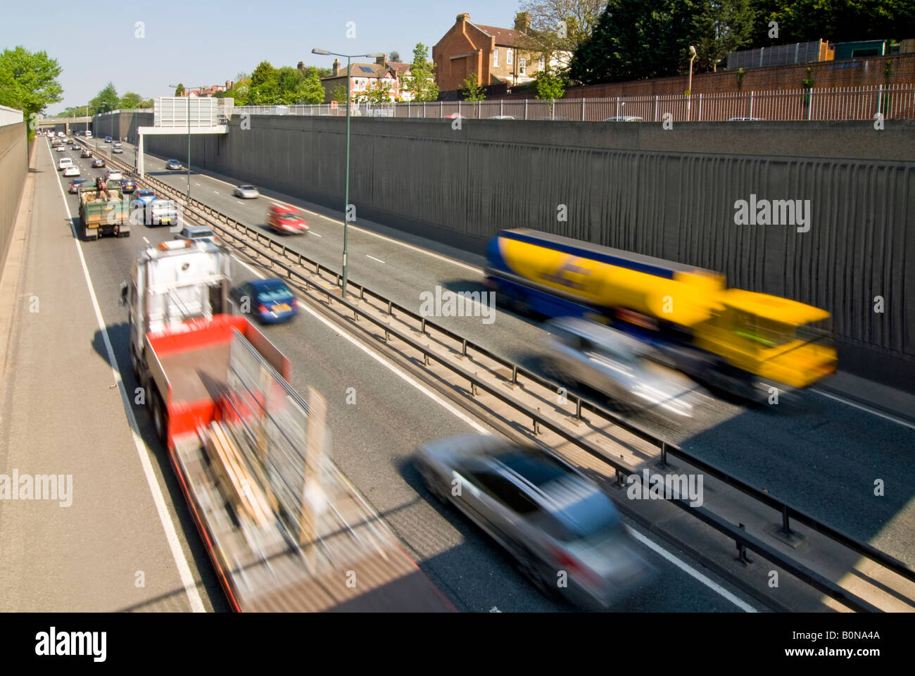 Horizontal elevated wide angle of the rush hour traffic driving along ...