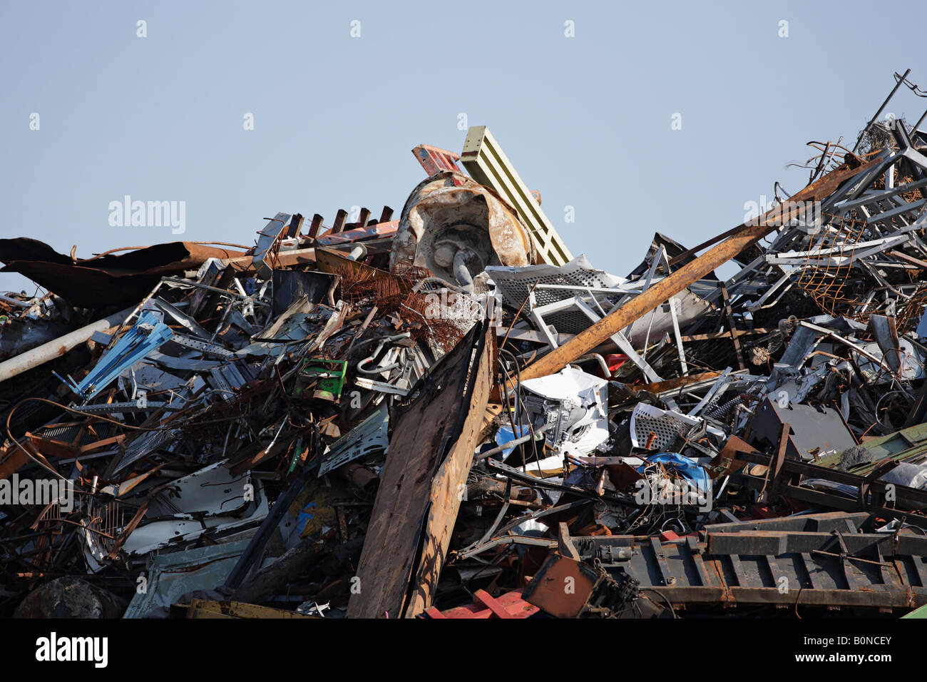 Pile of scrap metal in a scrapyard recycling environmental issues Stock ...
